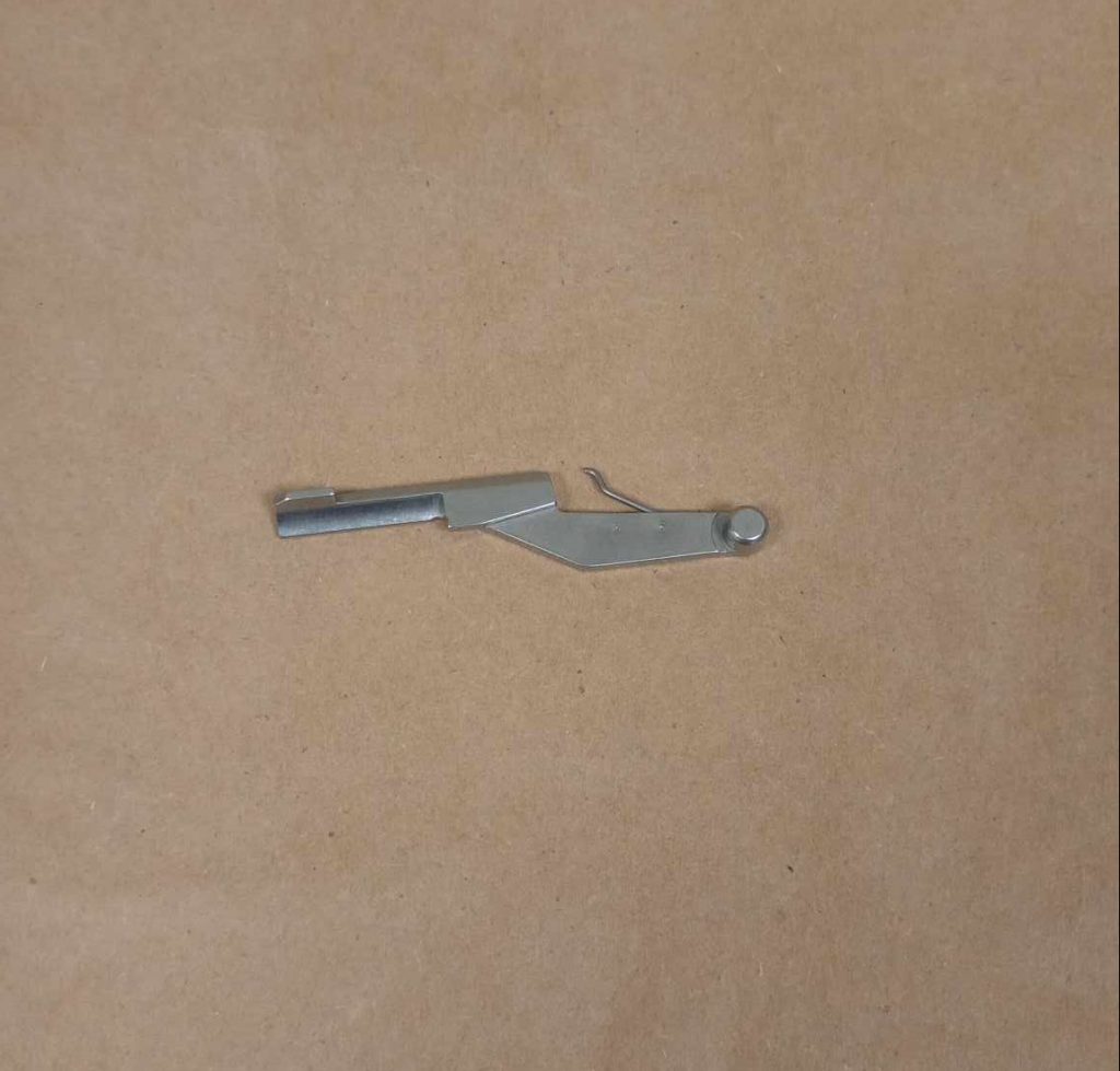 PPK-Ejector/ Slide Catch w/Spring – InterArms Inc.